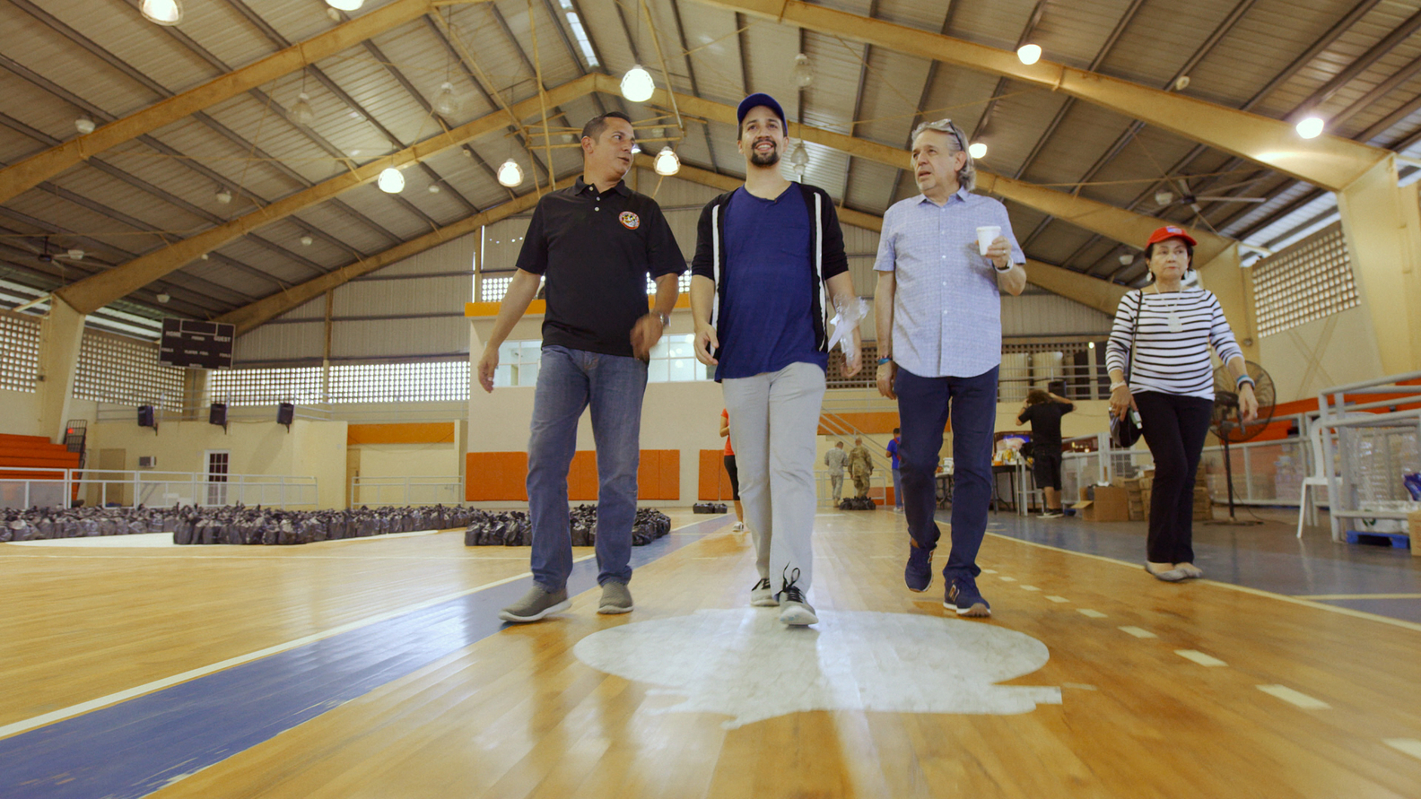 (center) Lin-Manuel Miranda with his father, Luis Miranda (right) and ...